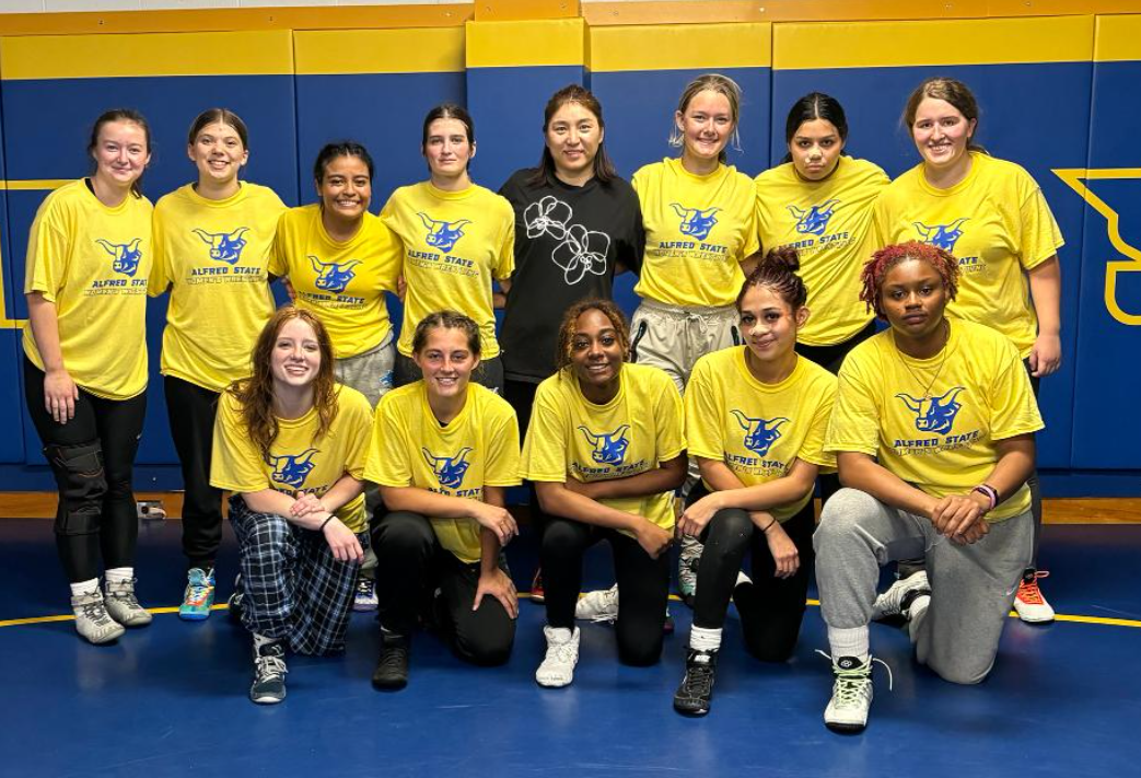 Mongolian bronze medalist wrestler works with ASC women’s wrestlers ...